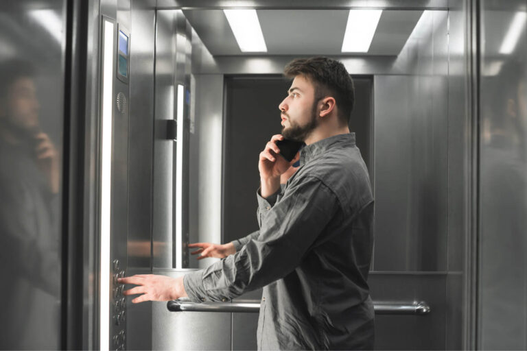 Who Answers the Elevator Emergency Phone? What to Know